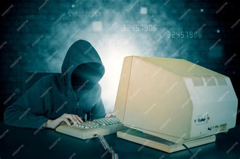 premium photo hacker typing on keyboard with binary code background