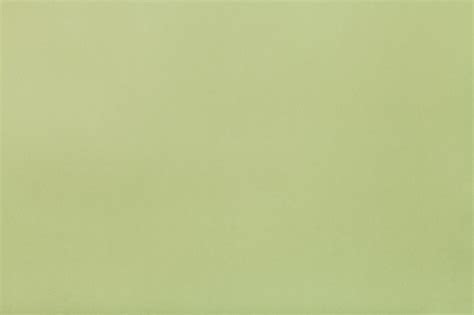 Premium Photo Background From Dark Olive Green Pastel Paper
