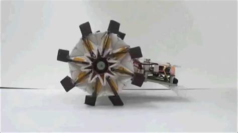 Deformable Mobile Robot With Origami Wheels Which Can Expand And Shrink In Size Automatically