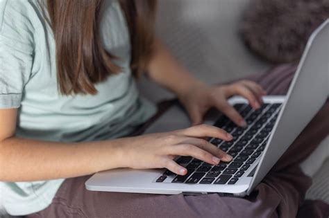 Free Photo The Girl Is Typing On The Laptop Keyboard Girls Hands On The Keyboard