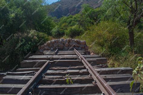 Premium Photo Concrete Buffer Stop Sign That Ends Railroad Tracks
