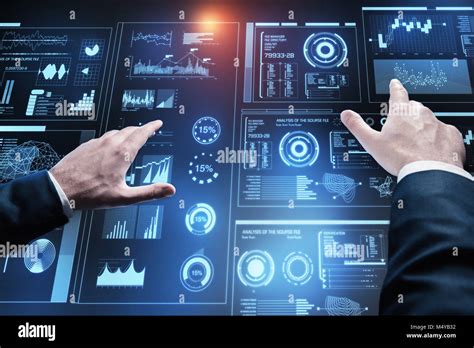 Smart Programmer Touching The Screen While Analyzing The Diagrams Stock Photo Alamy