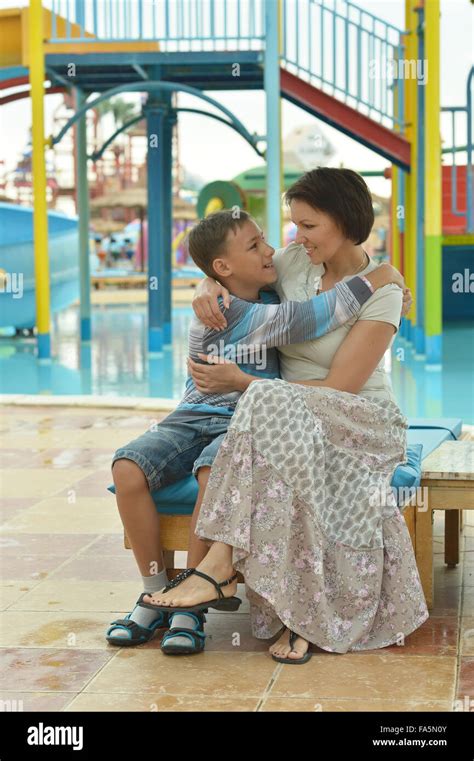 Boy With Mother On Playground Stock Photo Alamy