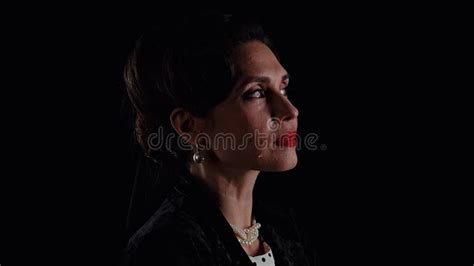 Retro Woman Actress With Pin Up Hairstyle And Makeup Isolated On Black