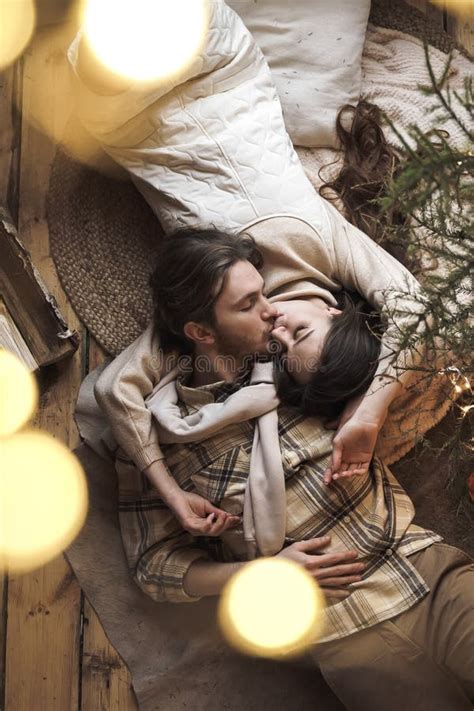 Kissing Stylish Love Couple Girl Guy Lie On Skin On Floor In Cozy Wooden Country House Chalet