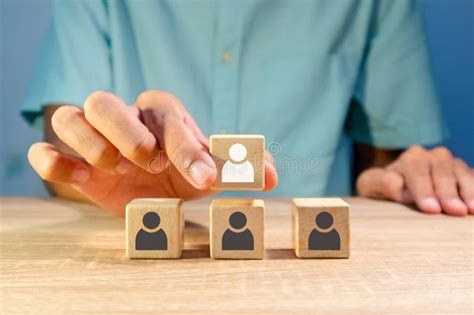 A Man Arranges The Hierarchy Of A Company S Business Organization A Man Arranges The Hierarchy Of A Company S Business Organization