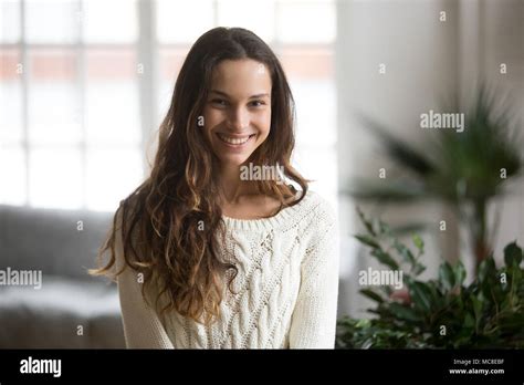 Happy Friendly Mestizo Woman Posing Indoor At Home In Casual Clothes