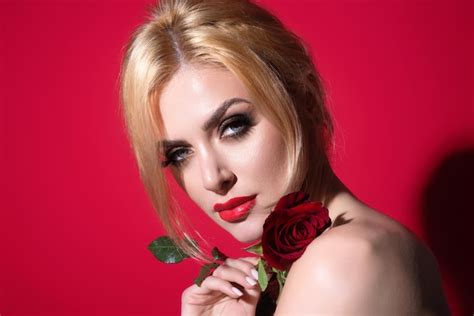 Premium Photo Seductive Woman Holding Red Rose Beautiful Model With Red Rose Flower Isolated