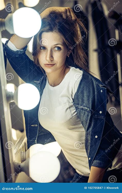 Woman In Dressing Room Undressing And Looking Away Stock Image Image