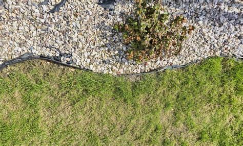 Aerial View Of Landscaped Garden Featuring A Transition Between Pebbles