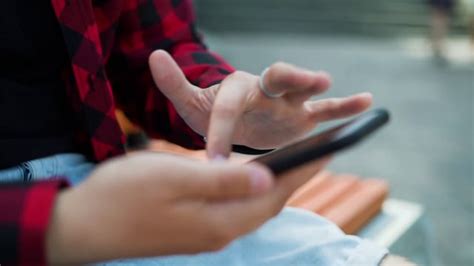 Scrolling On Phone Outdoors Free Stock Video Footage Coverr