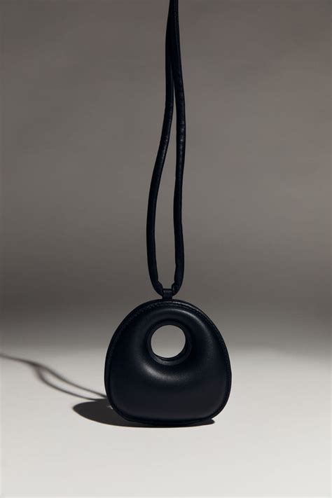 St Agni Shell Clutch Black