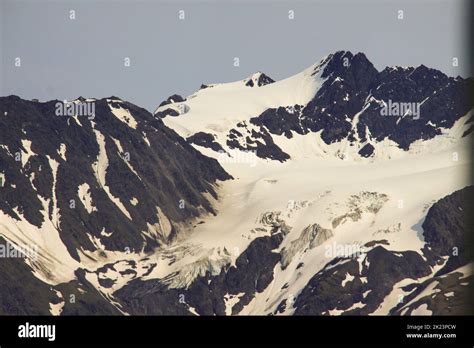 Snow Covered Mountain Peaks Photographed Near Homer Alaska Homer Is A