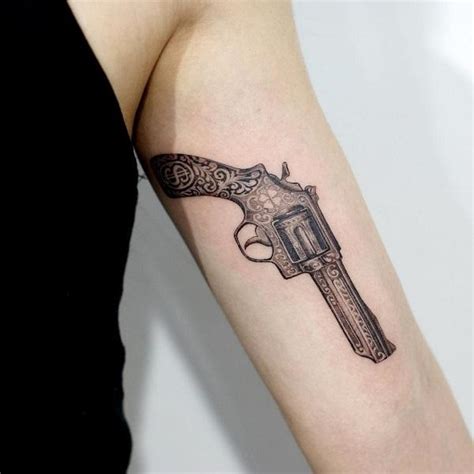 35 Awesome Gun Tattoo Designs Art And Design
