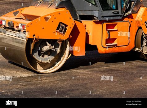 Vibratory Asphalt Roller Compactor Compacting New Asphalt Pavement