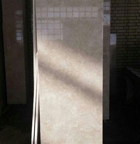 سنگ تراورتن حاجی آباد کرم ابر و بادی قیمت و کاربرد سنگ تراورتن حاجی