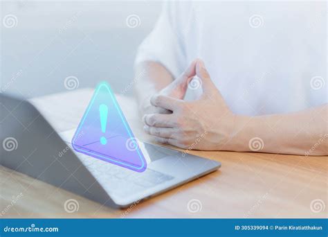 User Use A Computer Laptop With Caution Warning Sign For Notification