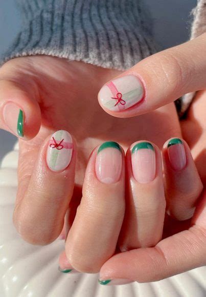 Festive Flourishes In Nail Art Red Bow Green French Tip Nails