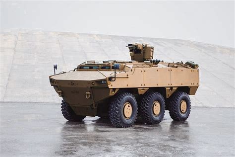 Army Vehicle Parked In The Snow Rosomak Military Vehicle Design 8x8