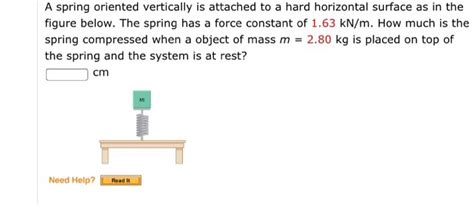 solved a spring oriented vertically is attached to a hard