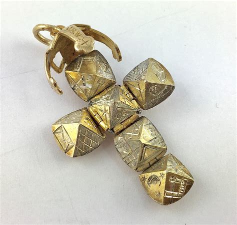 proantic masonic pendant opening ball on deploying cross symbols yell