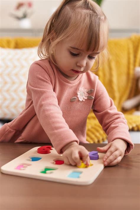 Adorable Blonde Girl Playing Maths Puzzle Game Standing At Home Stock Image Image Of Caucasian