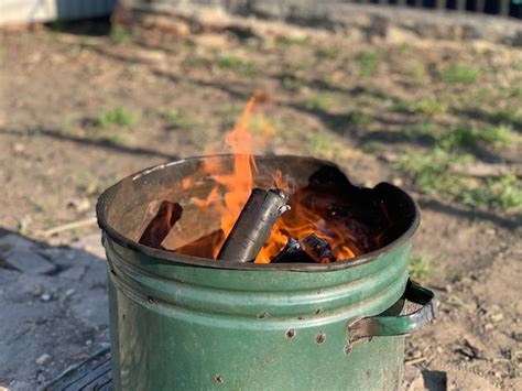 Premium Photo High Angle View Of Fire In Container