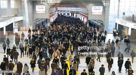Huge Crowd Of Rainbow Road Passageway In The Morning Commute At Konan