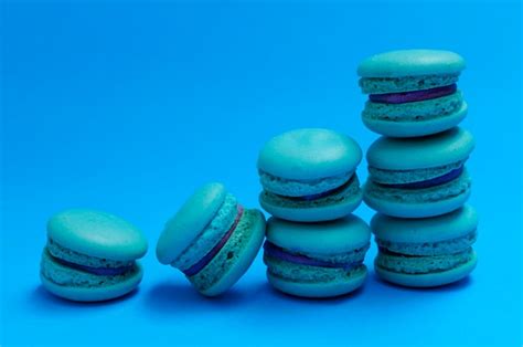 Premium Photo Stack Of Pebbles Against Blue Background