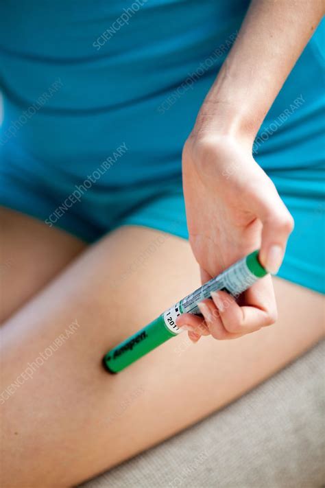 Woman Using Epipen Stock Image C032 7873 Science Photo Library