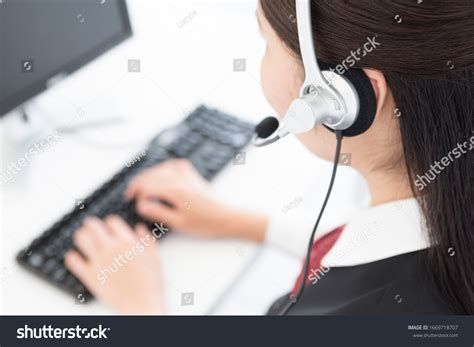 Female Operator Working On Personal Computer Stock Photo Shutterstock