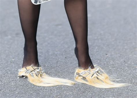 Julia Fox Wears Blonde Hair Extensions On Her Feet And Black Bodysuit