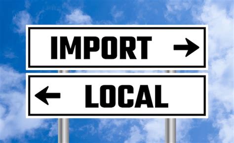 Premium Photo Import Or Local Road Sign On Cloudy Sky Background