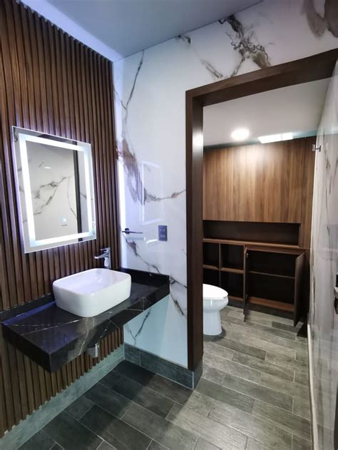 Modern Bathroom With Black Marble Countertop