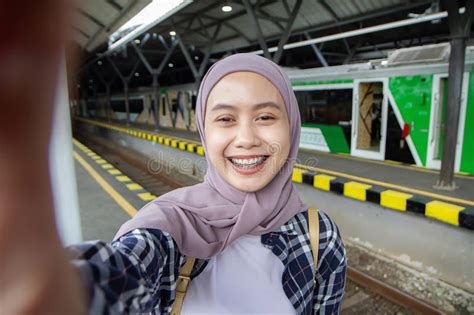 Pov Of Selfie Shoot Happy Asian Muslim Woman With Smile On Her Face At Train Station Traveling