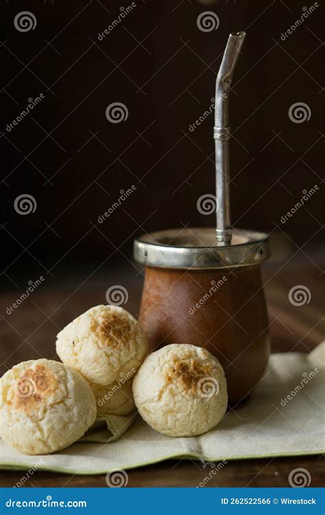 Vertical Shot Of Yerba Mate And Chipa Cheese Bread On The Table Stock