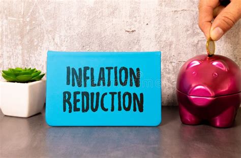 notepad chart and calculator top view text inflation reduction act
