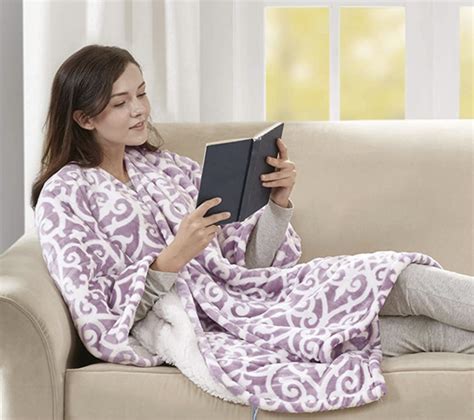 Run Cold Curl Up In This Super Soft And Cozy Heated Faux Sherpa Wrap