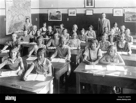 School Class Girls 1930s Pupils And Teacher In A Classroom With Maps