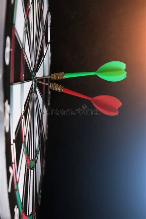 Dartboard With Green Dart Stuck In Center Stock Image Image Of Perfect Competition