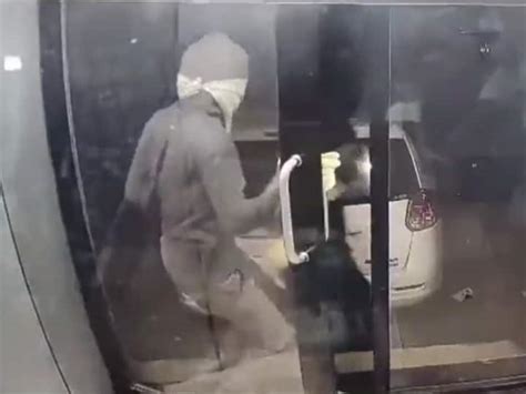 atm robbery viral video thieves looting atm machine using car in