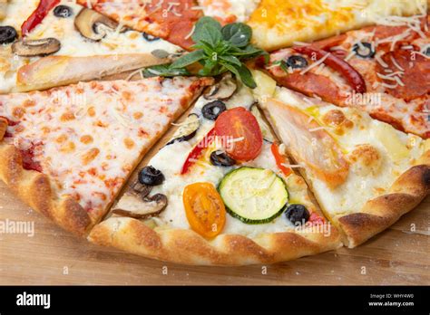 Assorted Pizza Slices Close Up With Different Ingredients Decorated