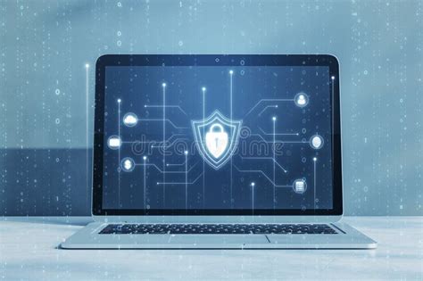 Close Up Of Laptop With Glowing Blue Padlock Shield With Digital Coding On Screen Concrete Wall