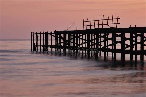 Lonely Pier In The Sea Under The Beautiful Sunset Stock Image Image