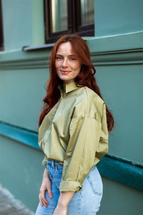 Young Woman With Long Ginger Hair Outdoors In City Young Woman Face