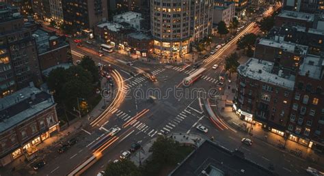 Busy Urban Intersection Captured At Night From An Elevated Perspective