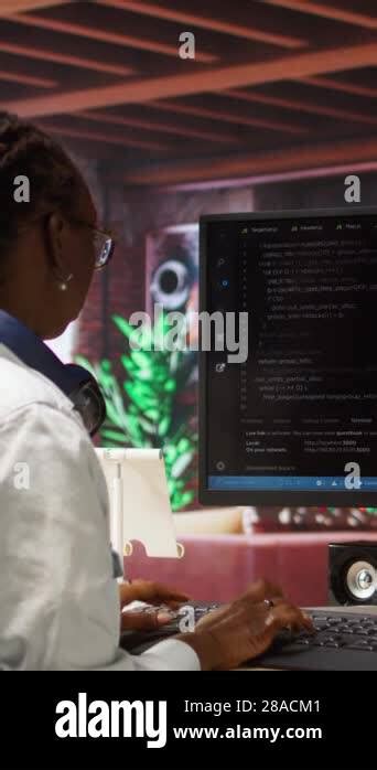 Vertical Video Admin Writing Code On Computer And Doing Maintenance On