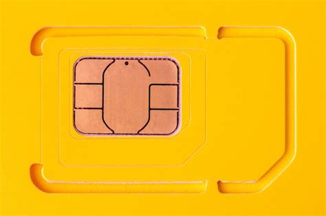 Premium Photo Yellow Sim Card For Phone Closeup