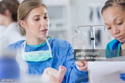 Two Nurses Checking Medication Photos And Premium High Res Pictures Getty Images