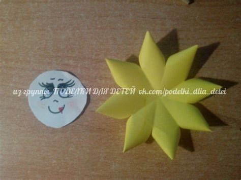 Цветочки солнышки в вазочке